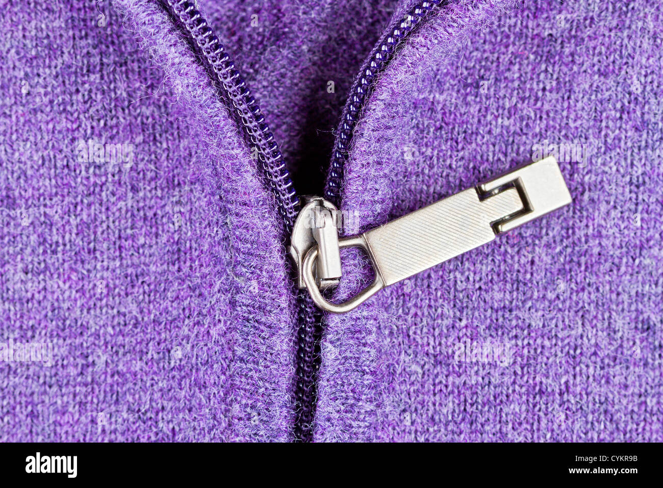 Partially unlocked zipper Stock Photo - Alamy