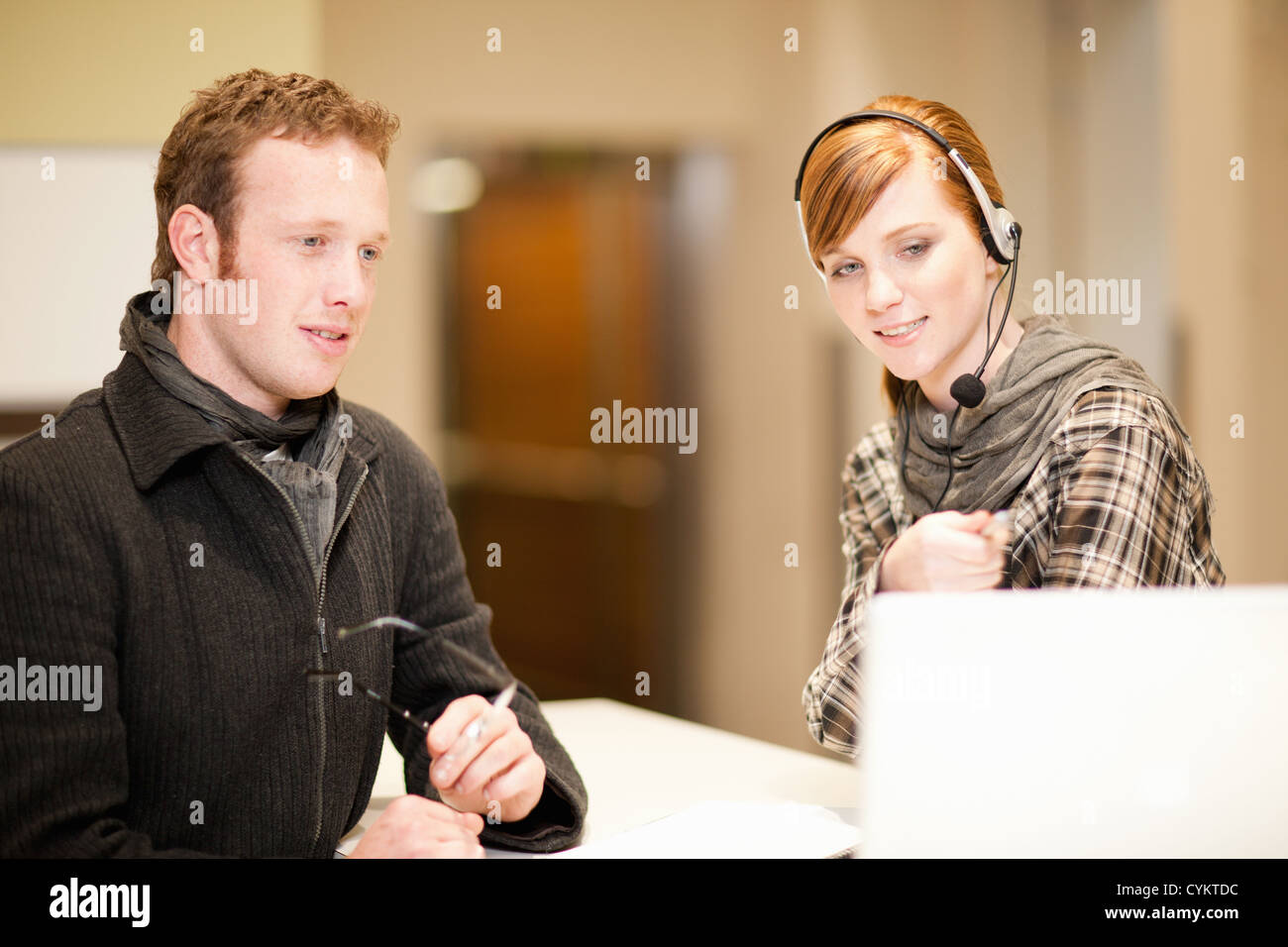 2 people talking customer support hi-res stock photography and images ...
