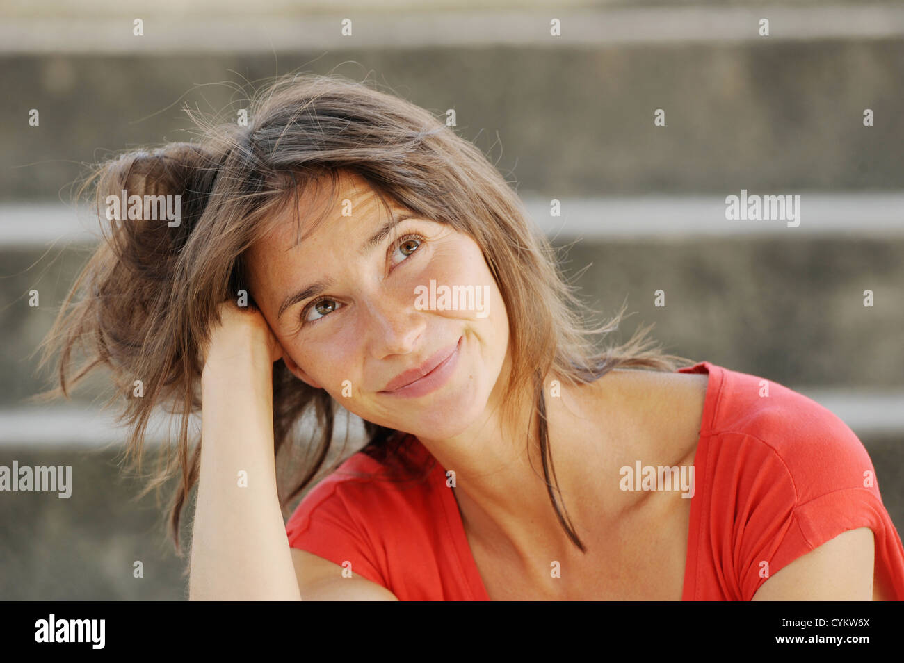 Woman mussing hair hi-res stock photography and images - Alamy