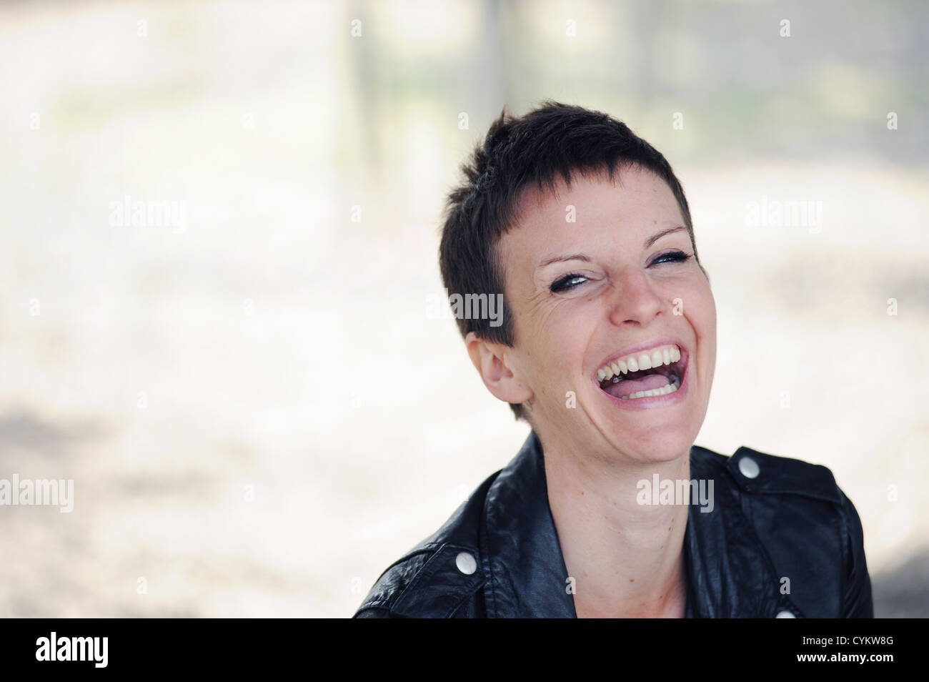 Close up of woman’s laughing face Stock Photo - Alamy