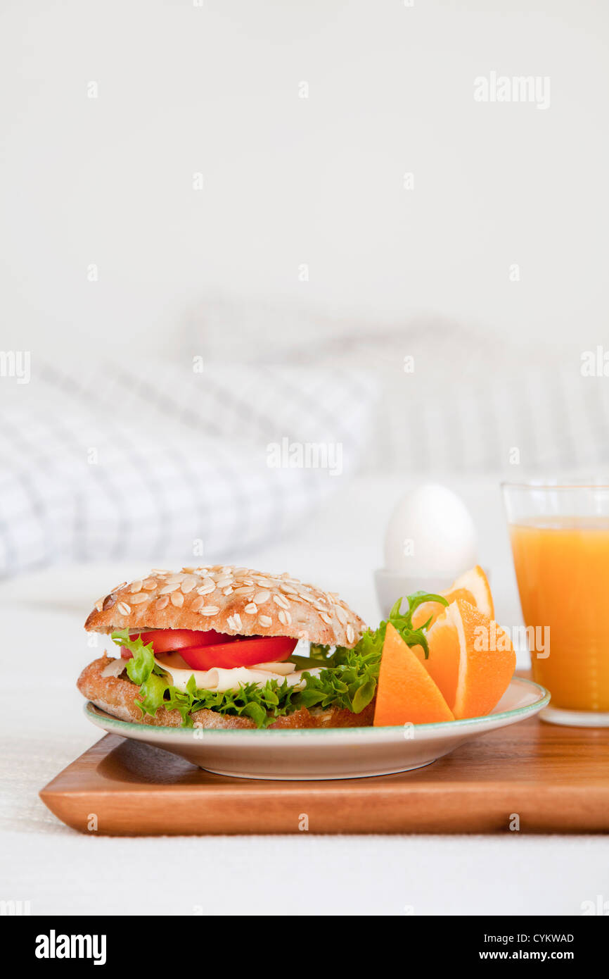 Tray of breakfast food on bed Stock Photo - Alamy