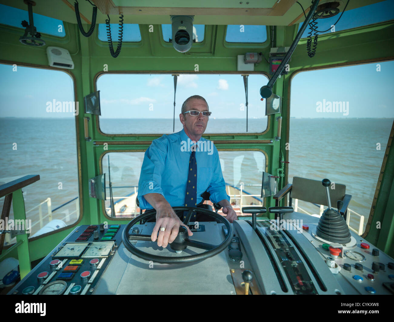 Captain at ships wheel hi-res stock photography and images - Alamy