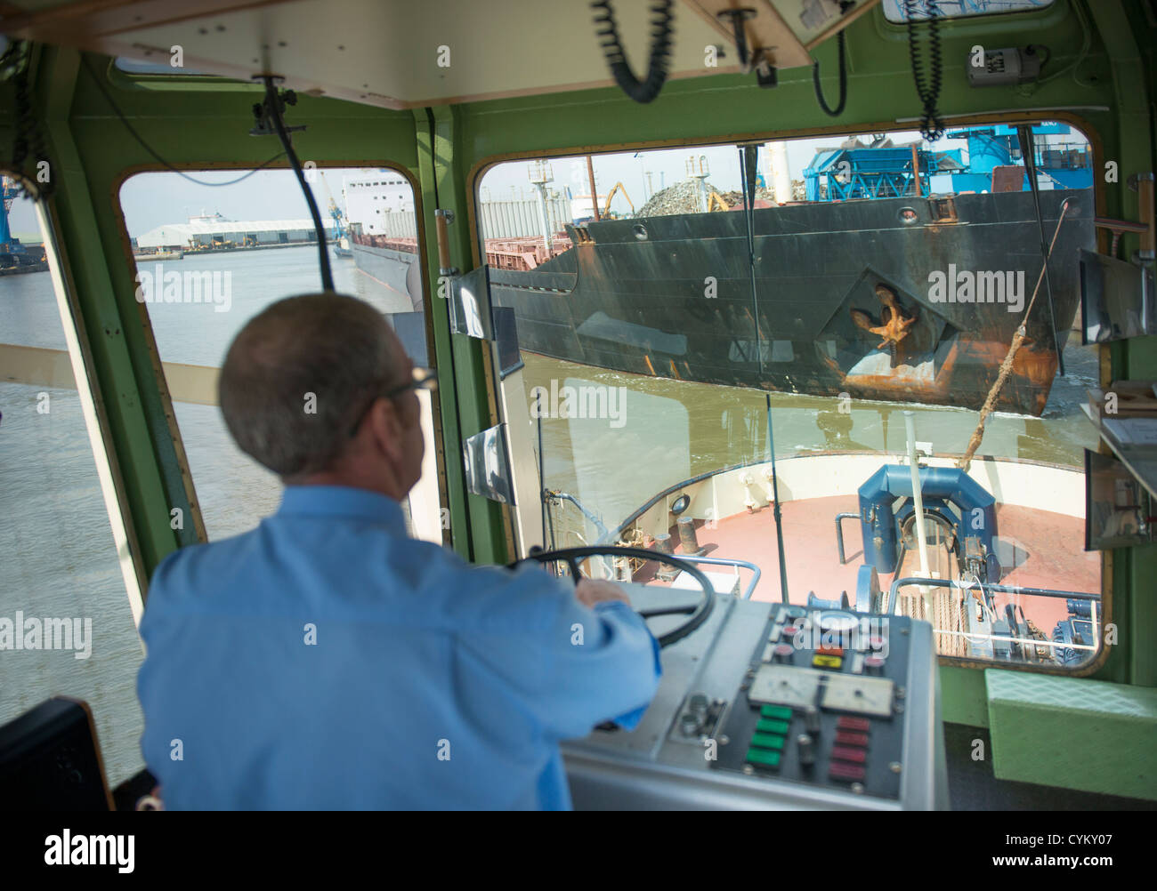 Ship captain steering boat hi-res stock photography and images - Alamy