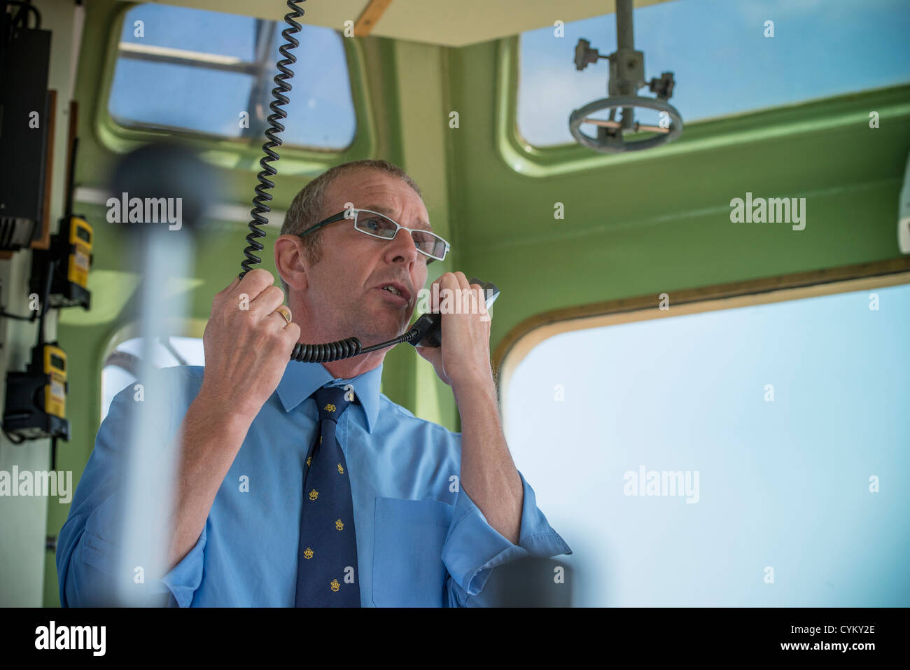 Captain talking on radio hi-res stock photography and images - Alamy