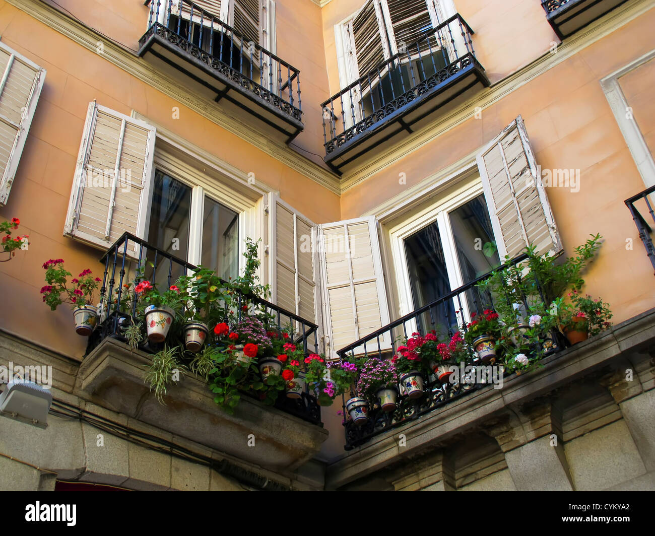 old house windows with plants Stock Photo - Alamy