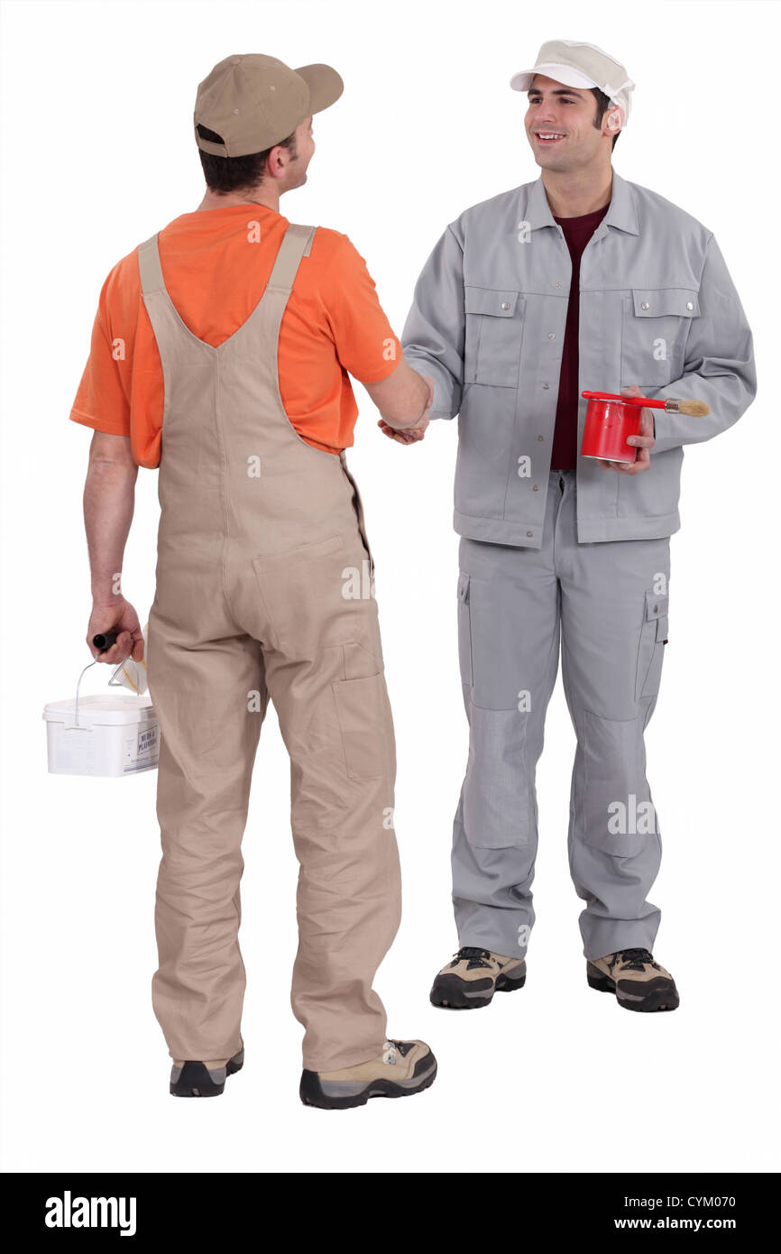 duo of painters shaking hands Stock Photo - Alamy