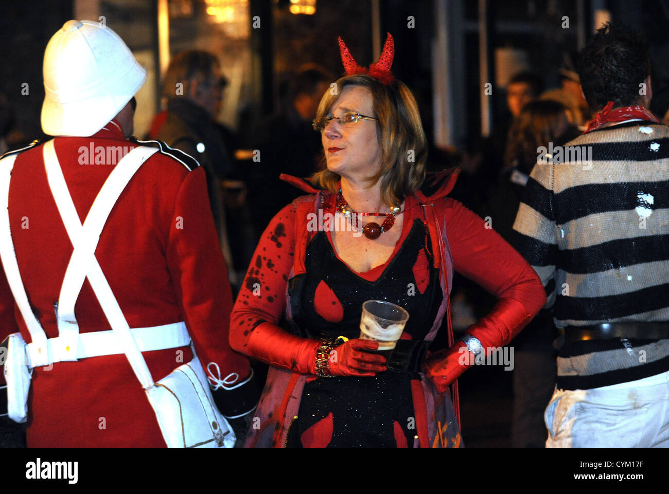 Woman wearing devils horns at the Lewes Bonfire celebrations 2012 East ...