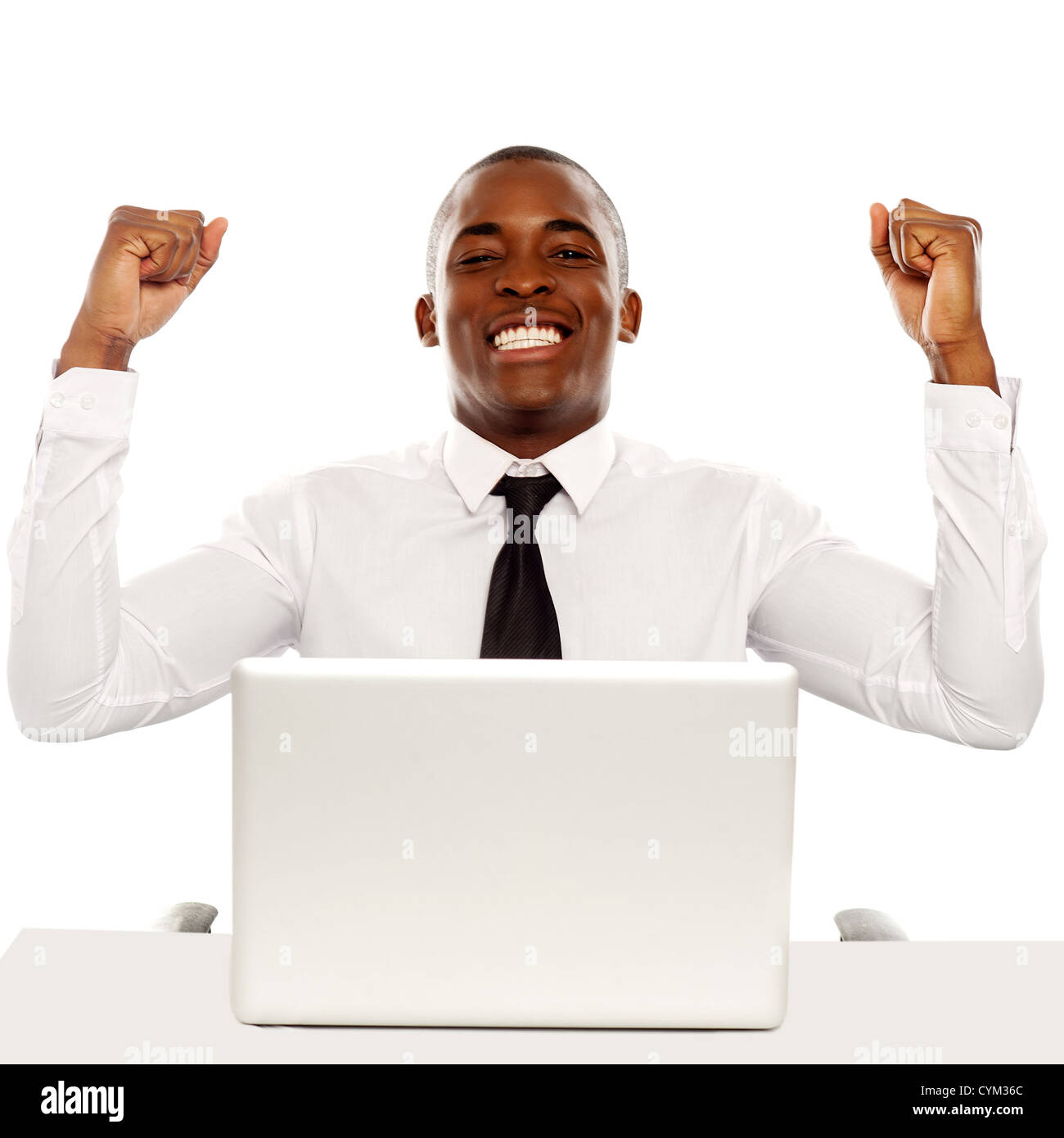 Victorious african business executive raising his hands in excitement ...