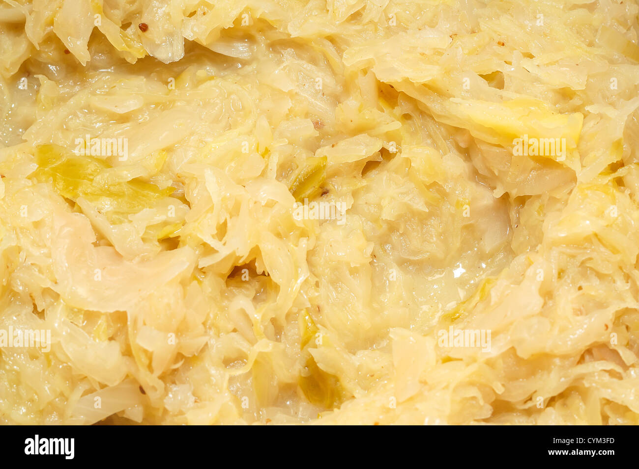 yellow cabbage cooking in a pot on the stove Stock Photo - Alamy