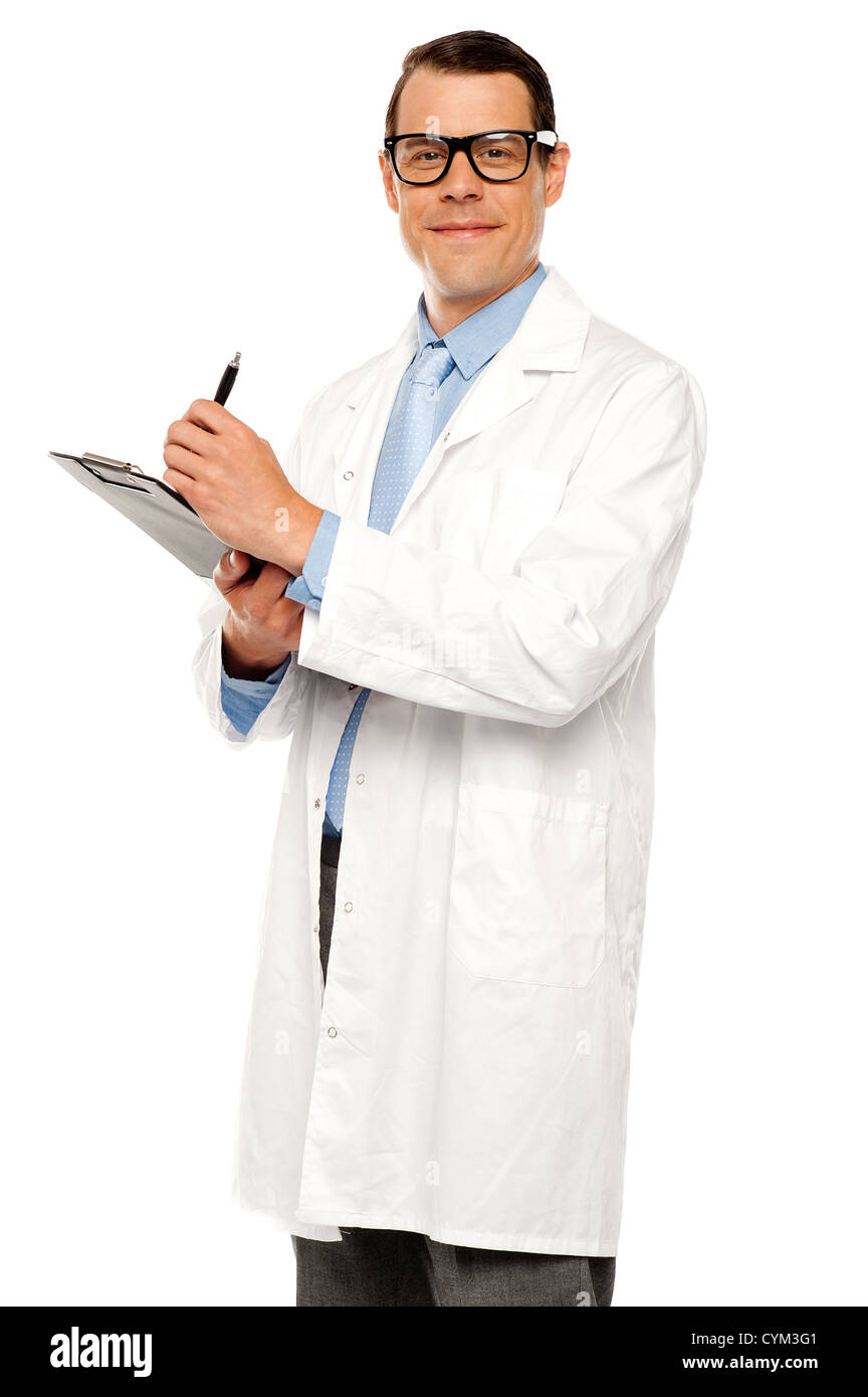 Medical expert posing with report and pen isolated over white ...