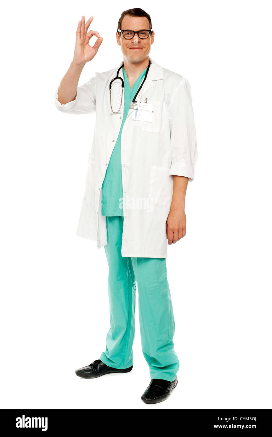 Medical practitioner showing excellent gesture isolated against white ...