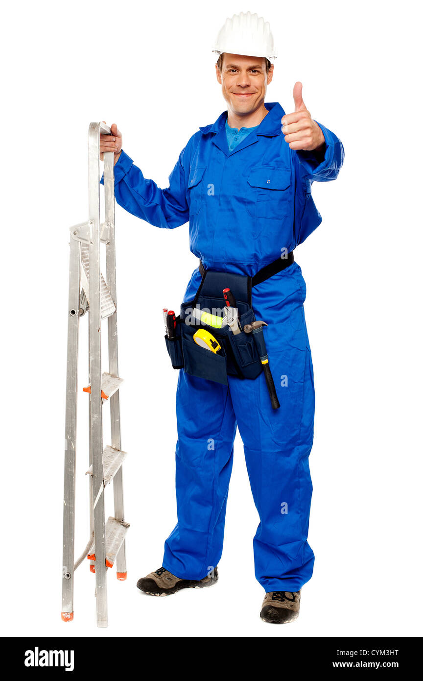 Repairman holding ladder and showing thumbs up gesture isolated on ...