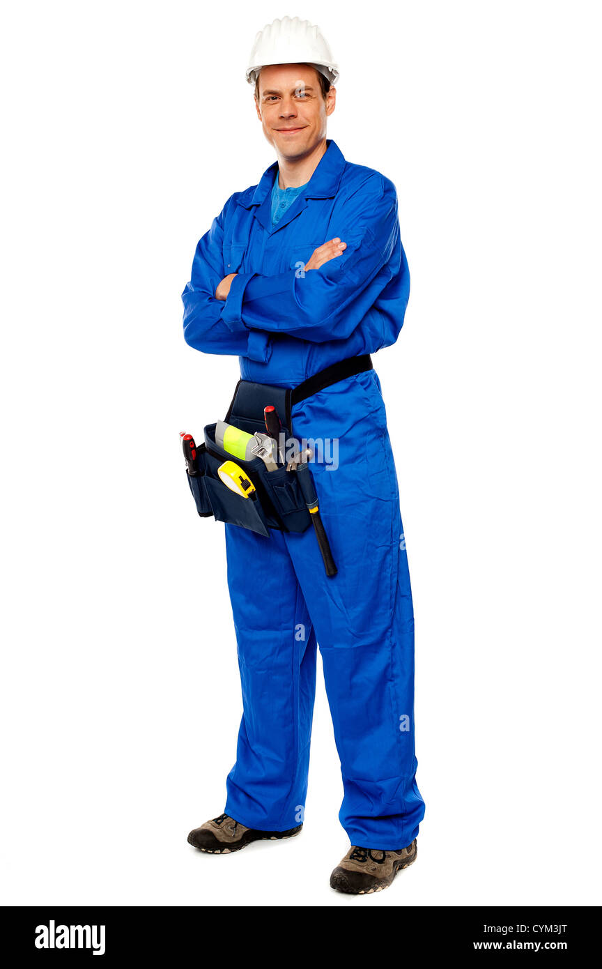 Industrial contractor posing with crossed arms isolated over white ...