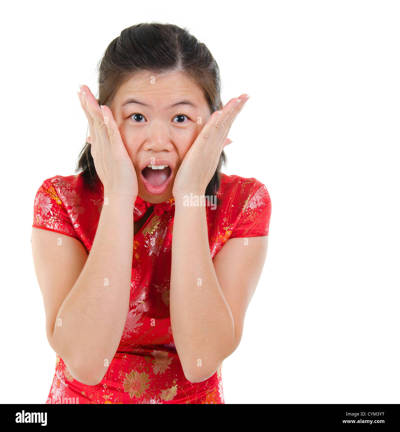 Oriental Asian female with cheongsam get shock over white background ...