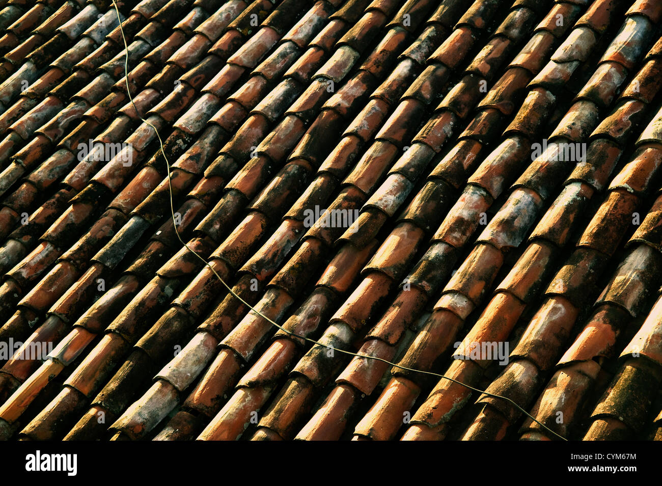 Red Tile Roof with Electrical Line Running Across it in Central America ...