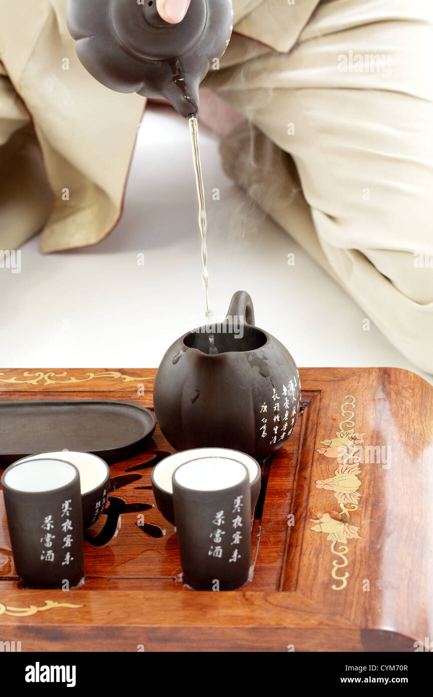 closeup picture of tea ceremony set in action Stock Photo - Alamy