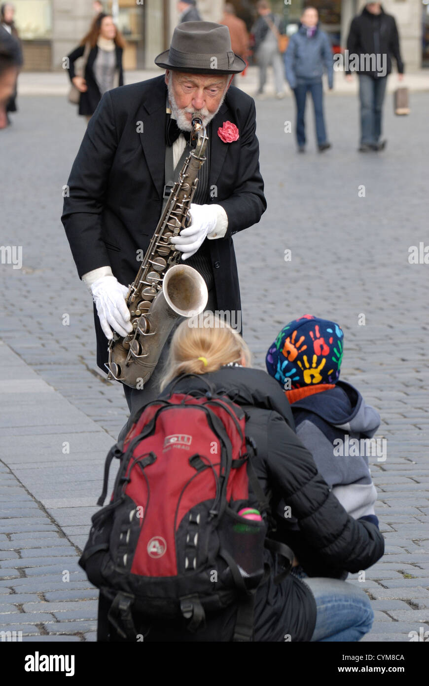 Old man playing saxophone hi-res stock photography and images - Alamy