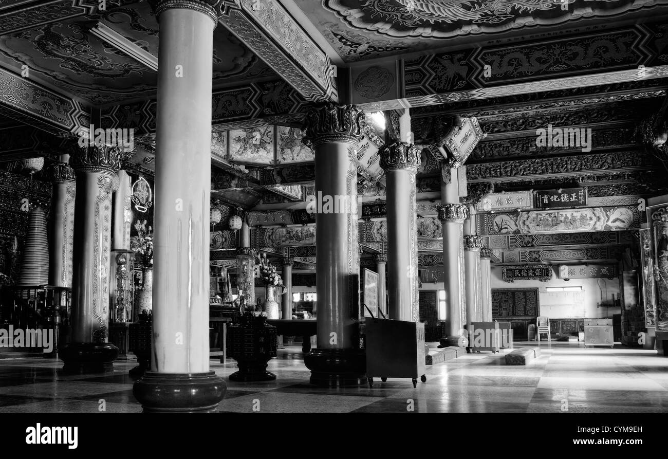 Inside temple structure of classic Chinese building with pillars and ...