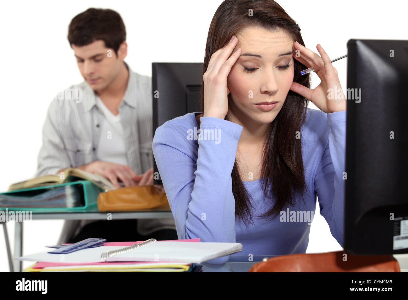 Student with a headache at a computer Stock Photo - Alamy