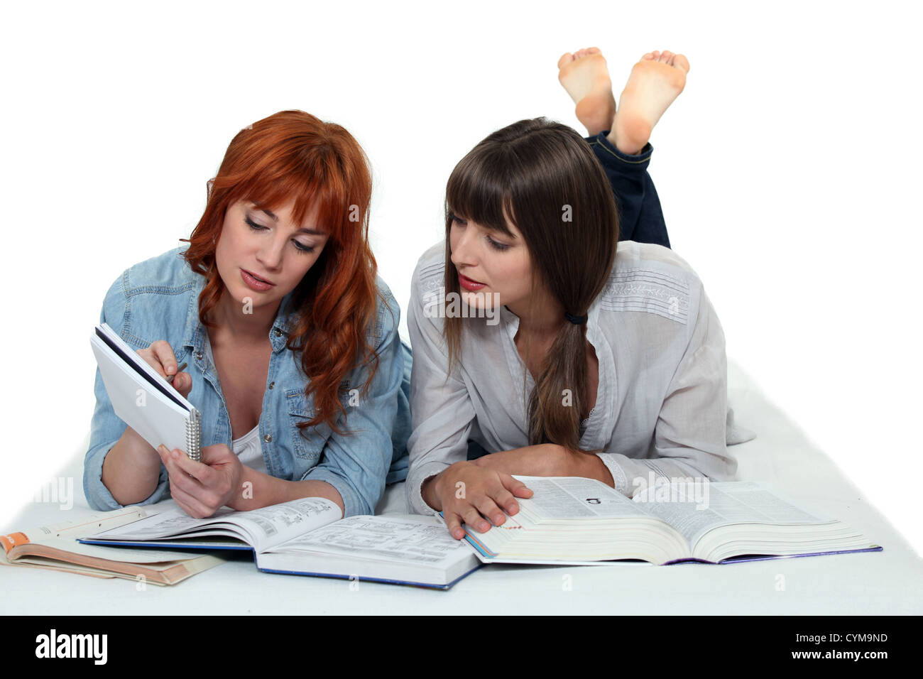 Two girls studying together Stock Photo - Alamy