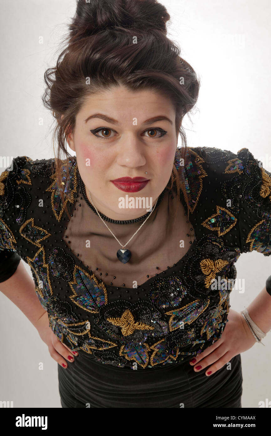 Confident teenage girl looking directly into the camera Stock Photo - Alamy