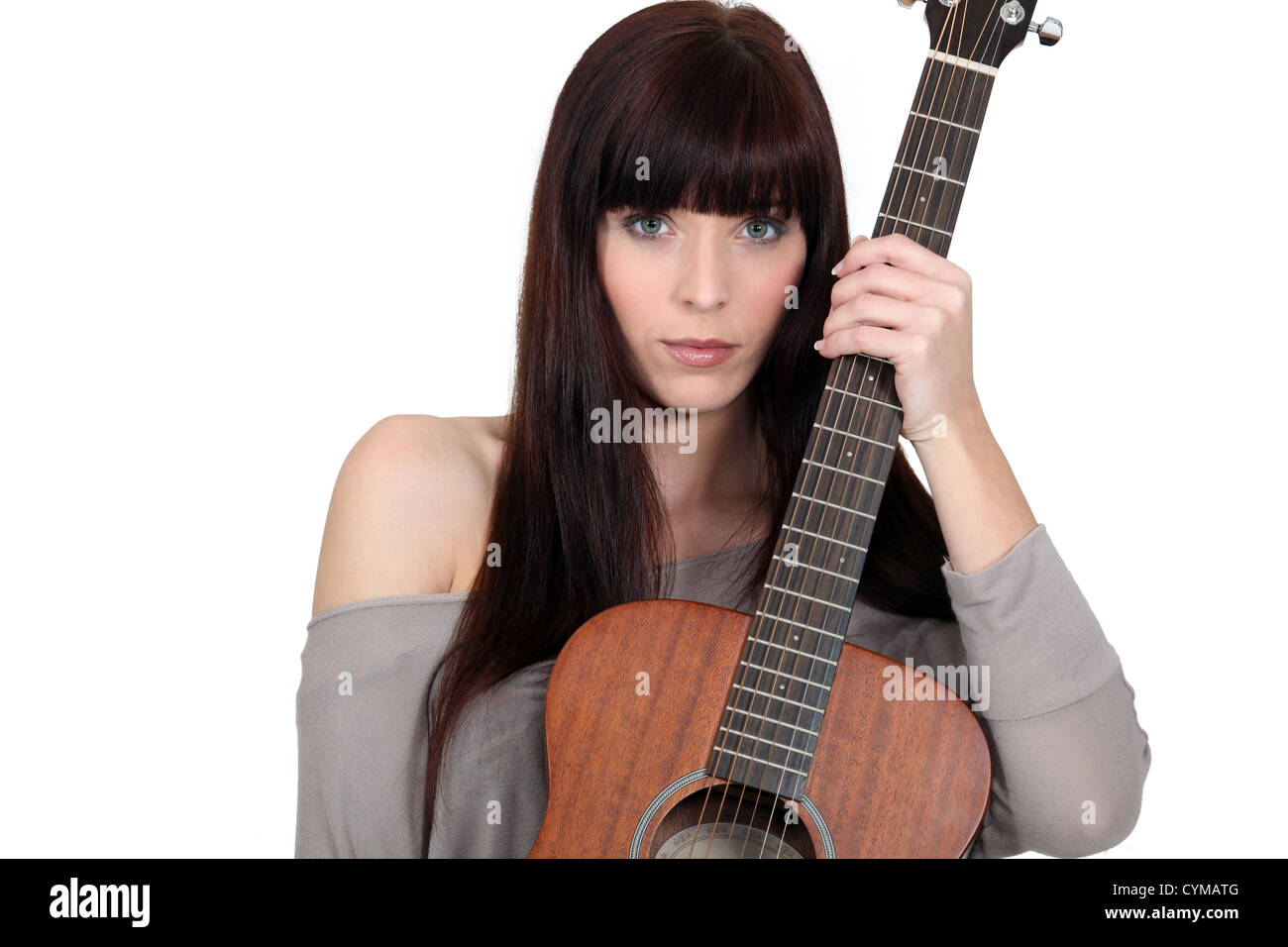 Woman with a guitar Stock Photo - Alamy