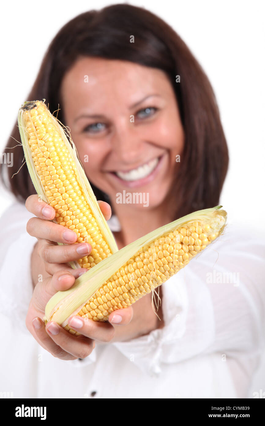 Woman fresh corn cobs hi-res stock photography and images - Alamy