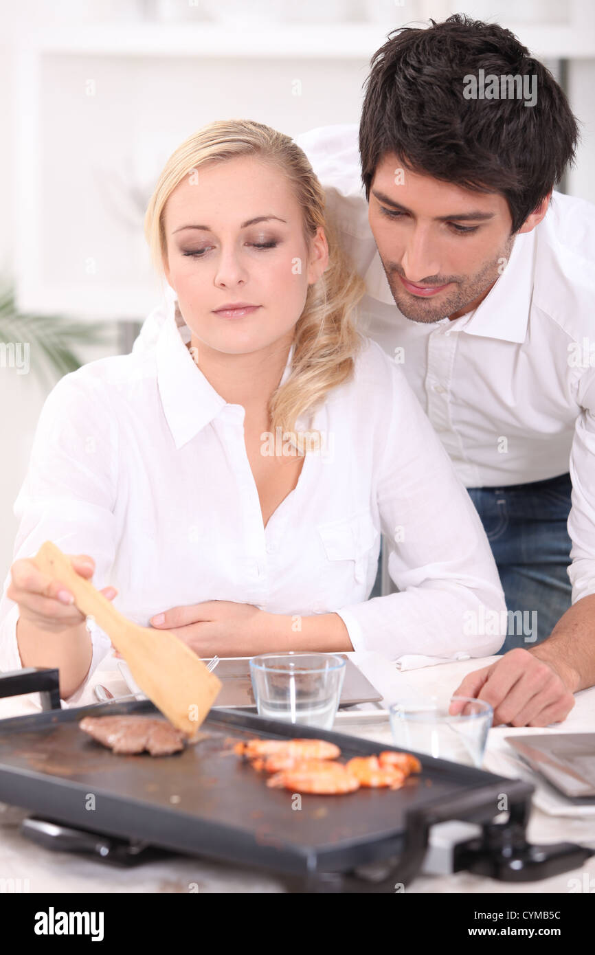 Chicken male adult barbecue cooking hi-res stock photography and images ...