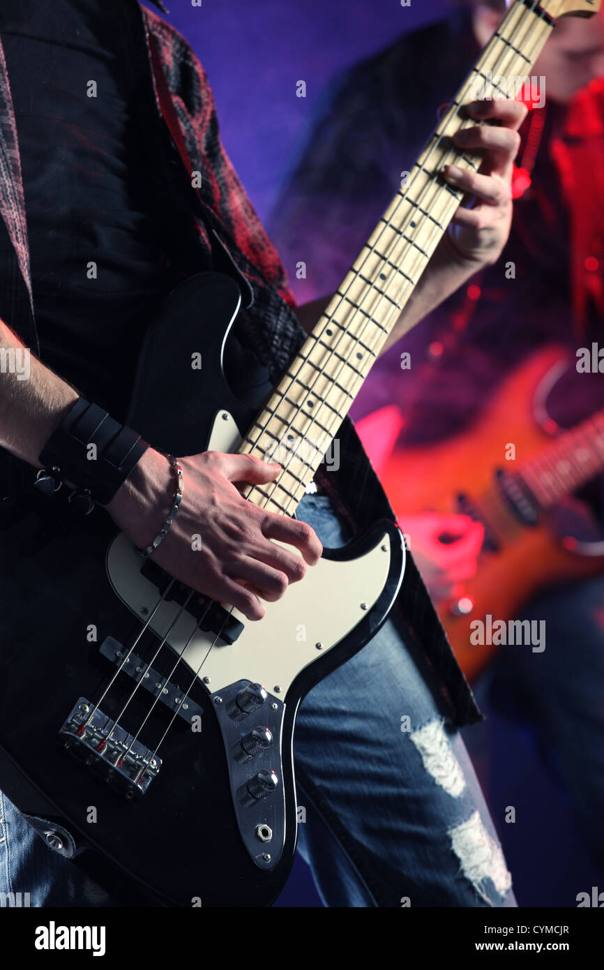 rock musicians playing at a live concert Stock Photo - Alamy