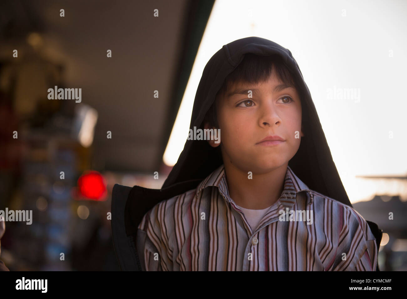 Serious Hispanic boy Stock Photo - Alamy