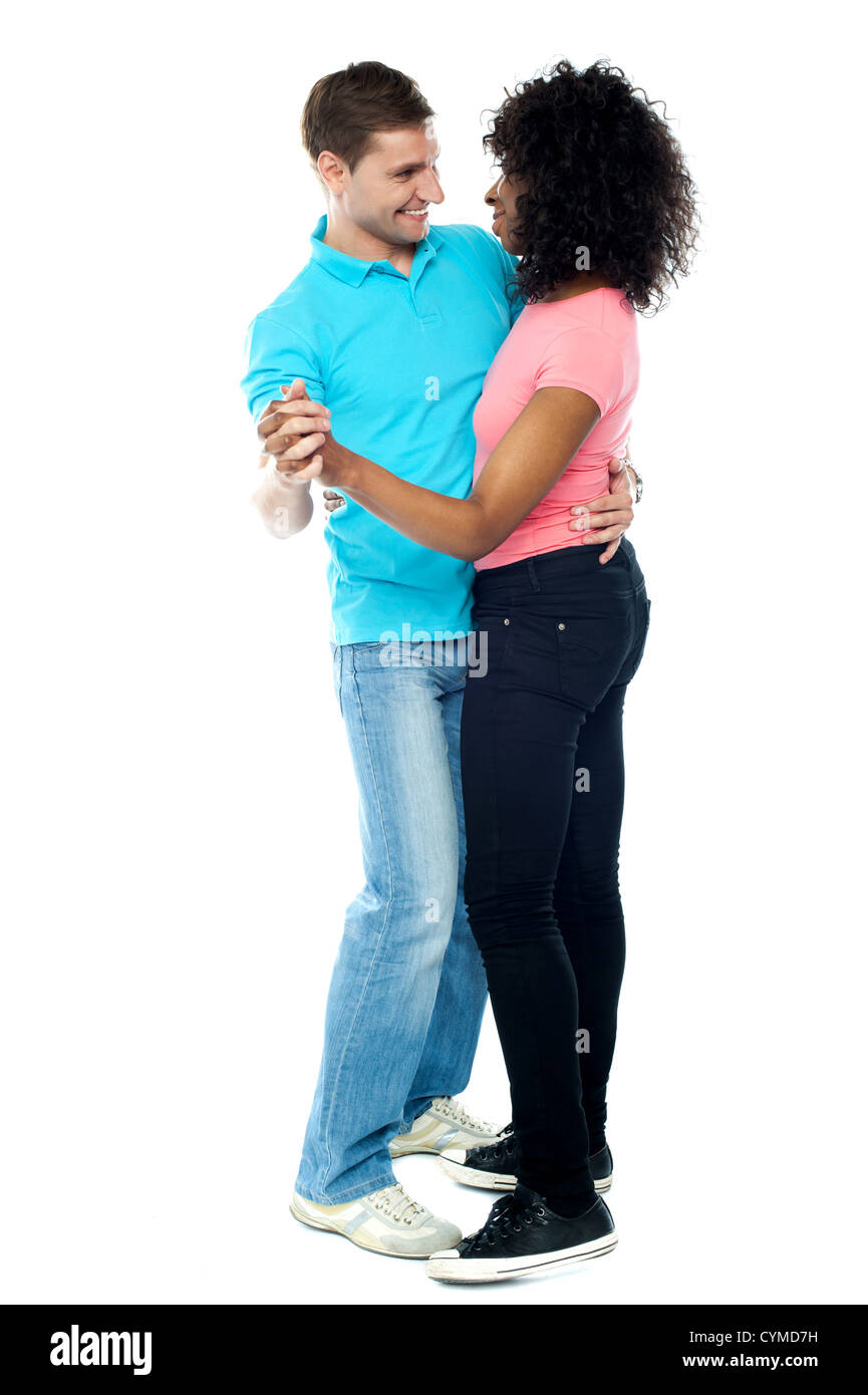 Full length portrait of adorable dancing couple enjoying themselves and ...