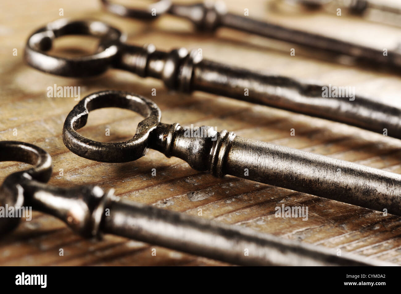old keys on a wooden table, close-up Stock Photo - Alamy