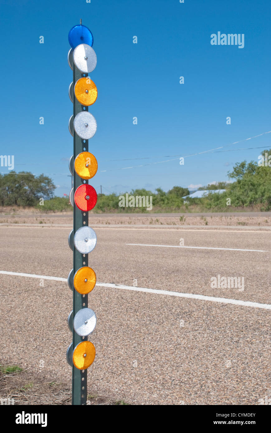 A whole line of reflectors indicate a driveway's location Stock Photo ...