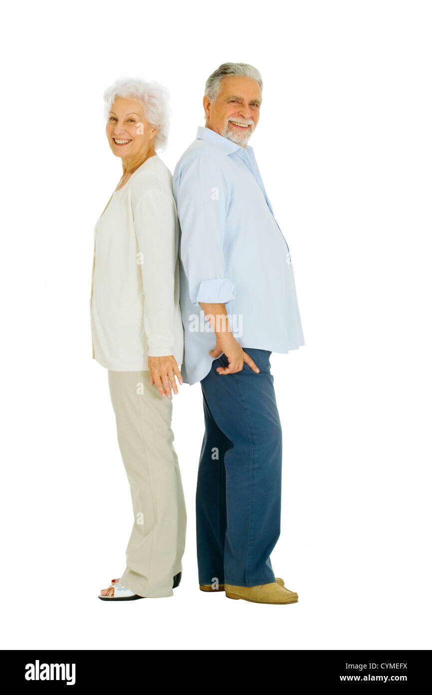 elderly couple back to back Stock Photo - Alamy