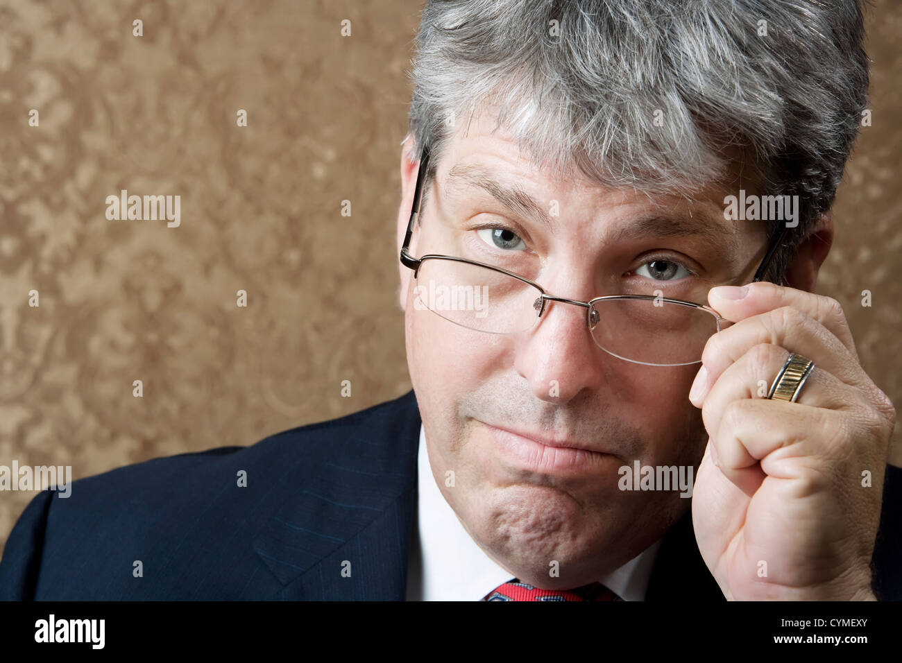 Looking over glasses, stern hi-res stock photography and images - Alamy