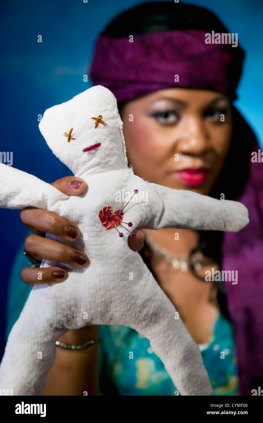 Gypsy fortune teller with an unfortunate voodoo doll Stock Photo - Alamy