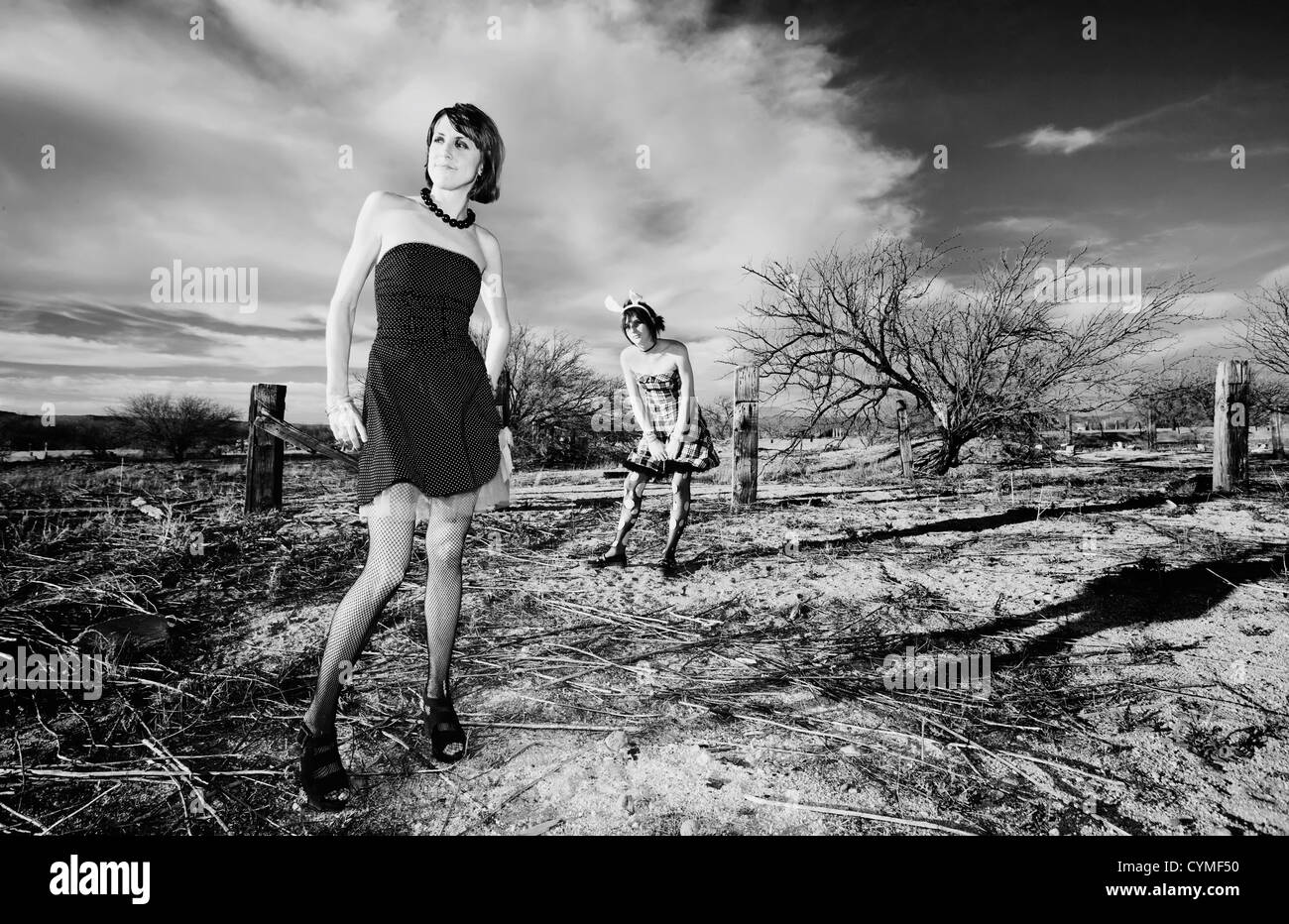 Two punk girls posing in a rural setting Stock Photo - Alamy