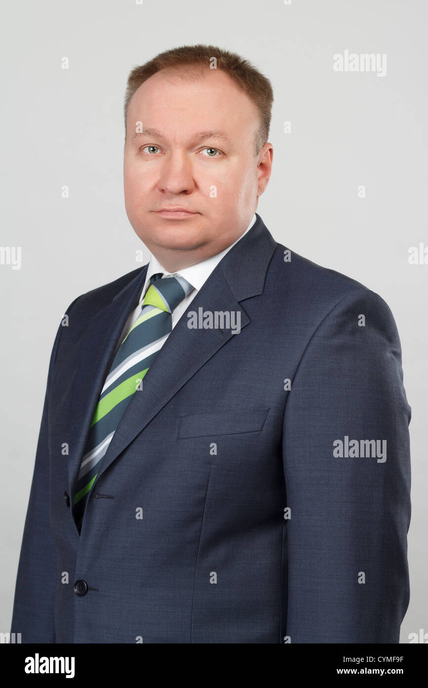 Corporate portrait of a man employee of a big company Stock Photo - Alamy