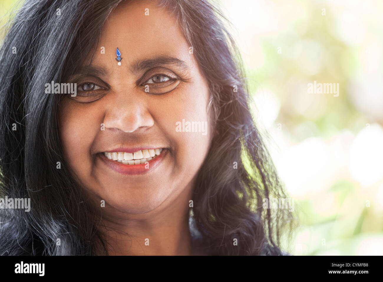 Indian woman jewel on forehead hi-res stock photography and images - Alamy
