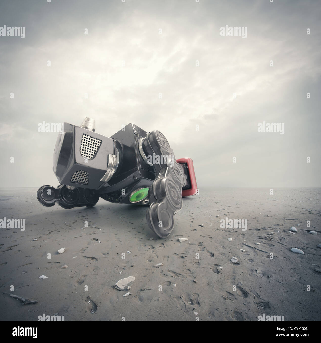 a retro tin robot toy fell, on an apocalyptic background Stock Photo ...