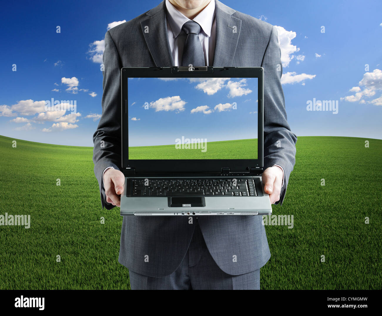 Businessman holding his laptop Stock Photo - Alamy