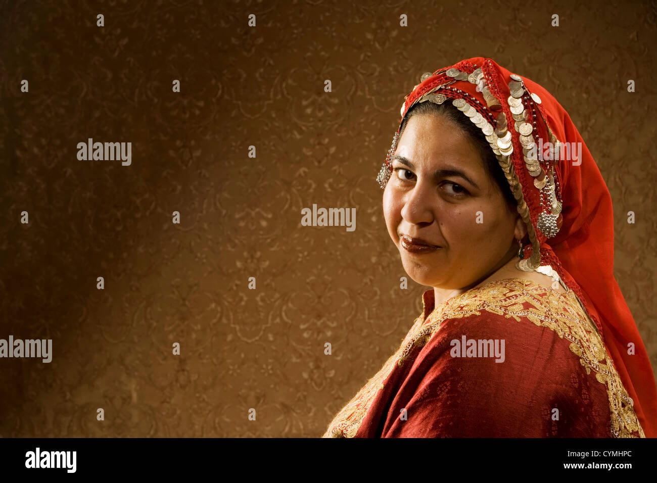 Portrait of a Muslim Woman in a Red Head Scarf Stock Photo - Alamy