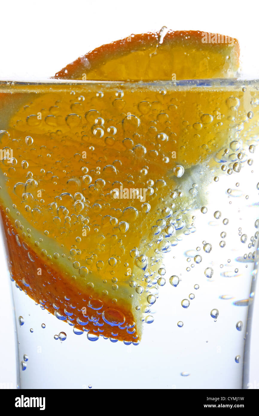 Single orange slice in glass Stock Photo - Alamy