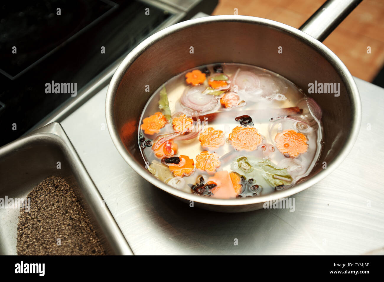 Marinating vegetables. Carrots, in a commercial kitchen Stock Photo - Alamy