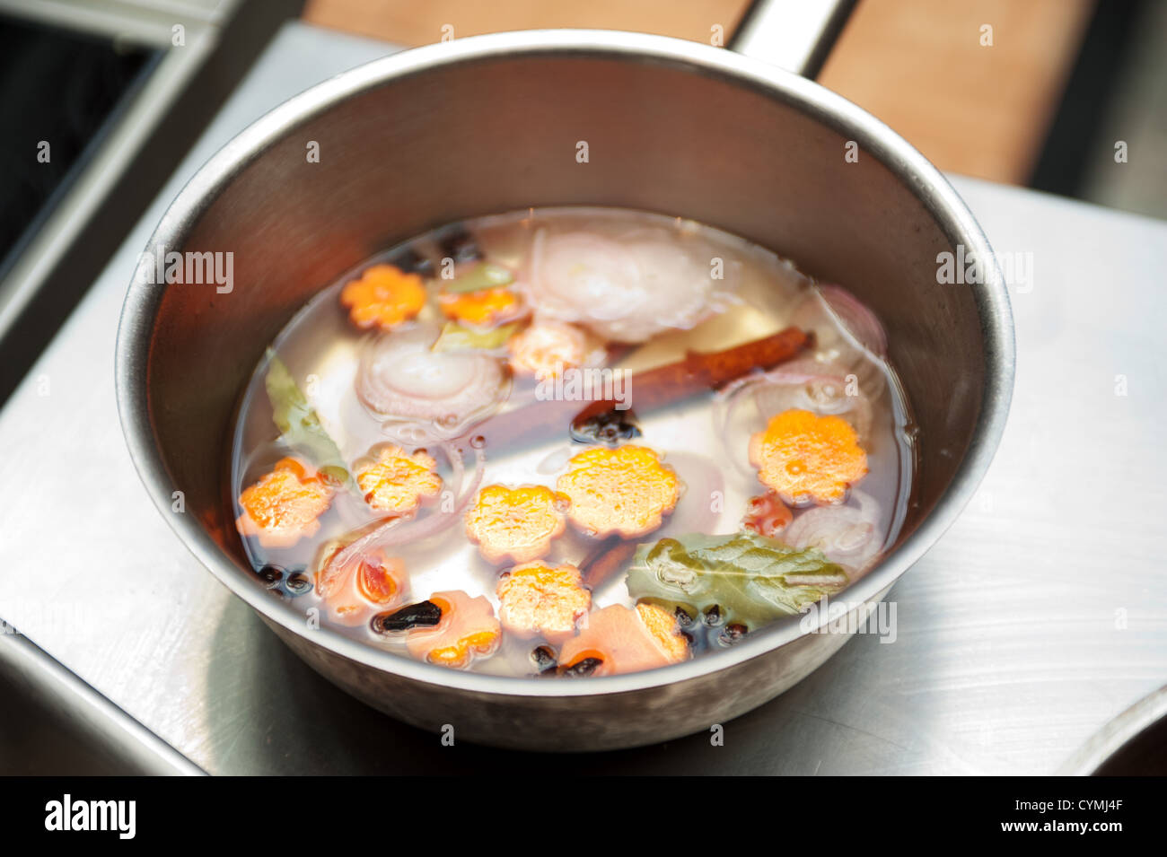 Marinating vegetables. Carrots, in a commercial kitchen Stock Photo - Alamy
