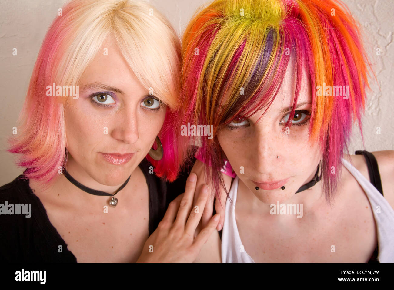 Two hip girls with brightly colored hair Stock Photo - Alamy