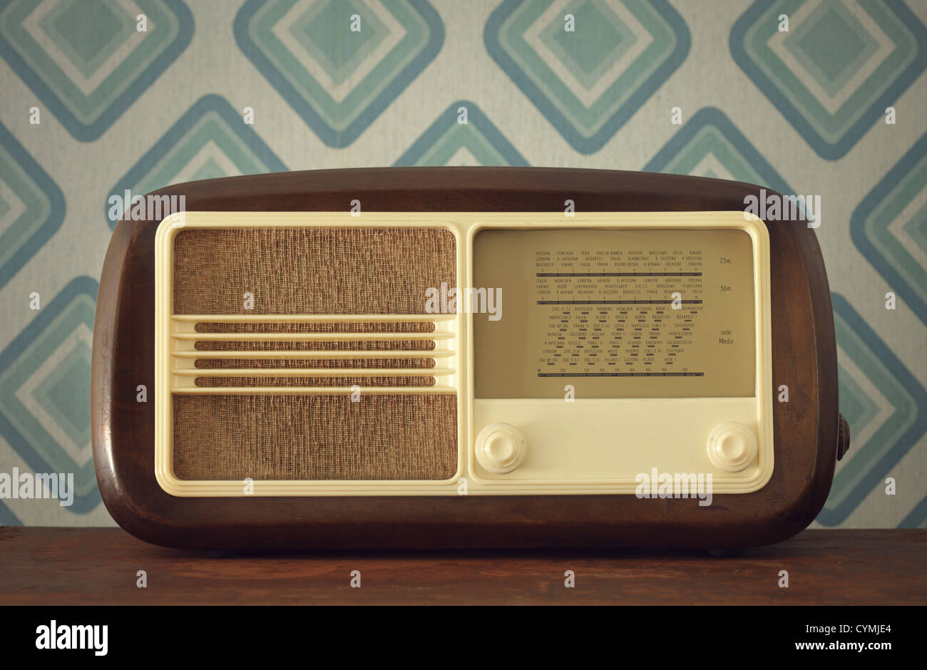 antique radio on vintage background Stock Photo - Alamy