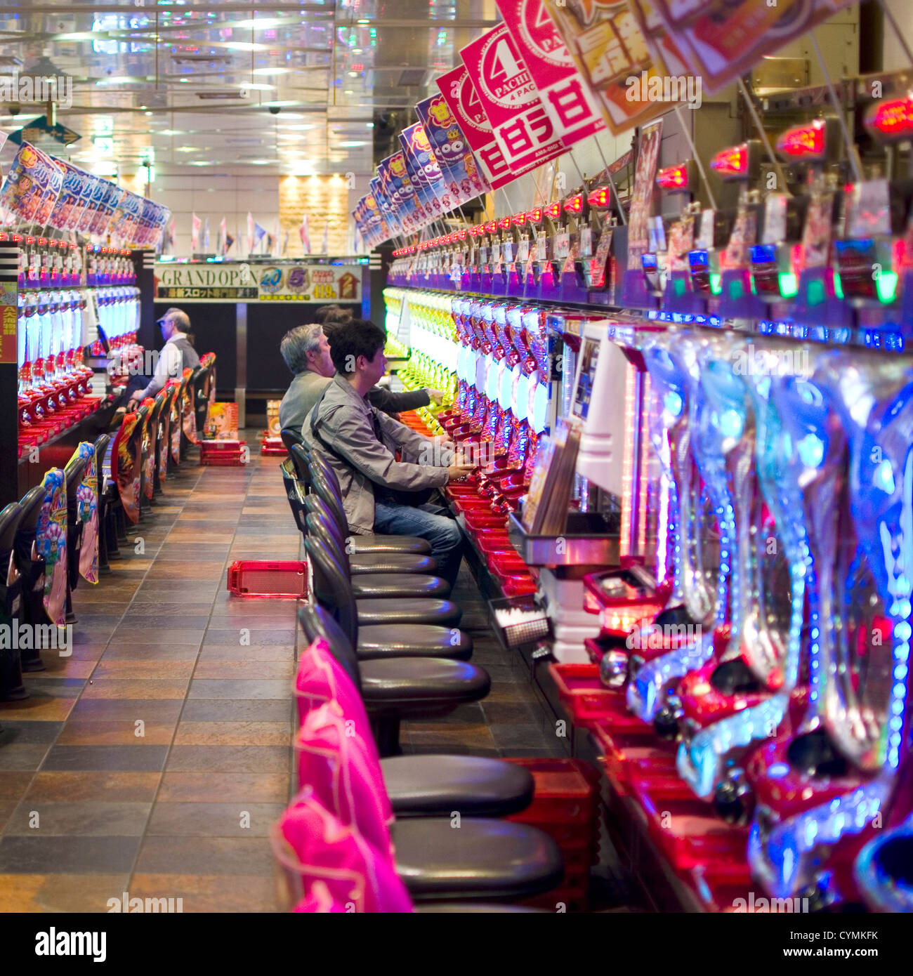 Japanese men playing pachinko in Namba region of Osaka Stock Photo - Alamy