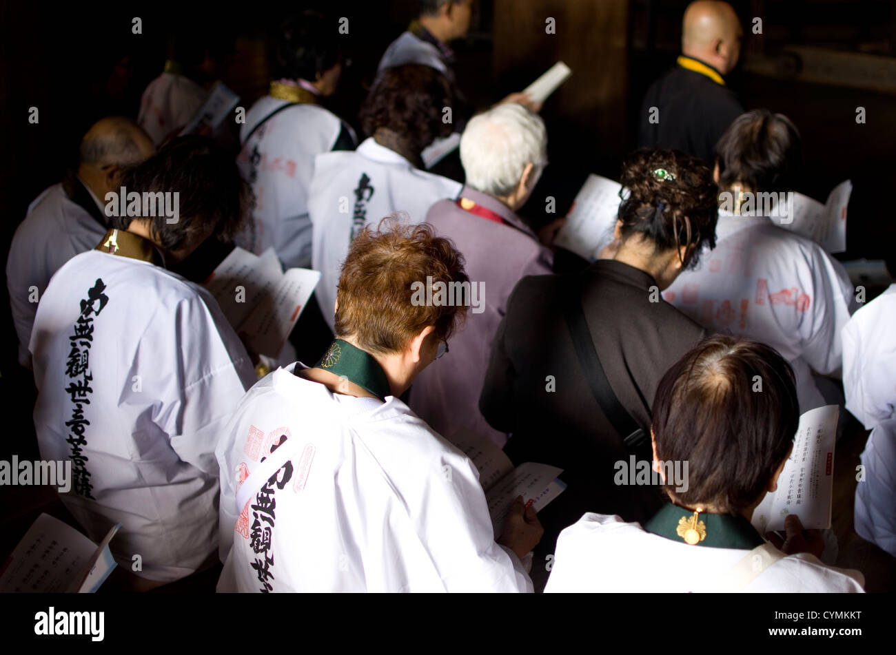 Japanese Buddhists praying in a Temple in Nara Stock Photo - Alamy