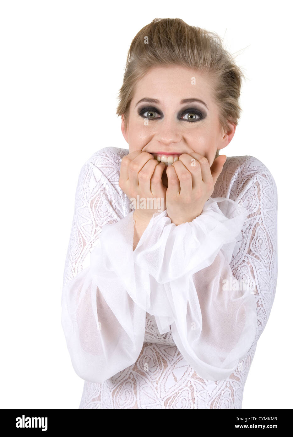 Girl in white dress showing guilty emotion Stock Photo - Alamy